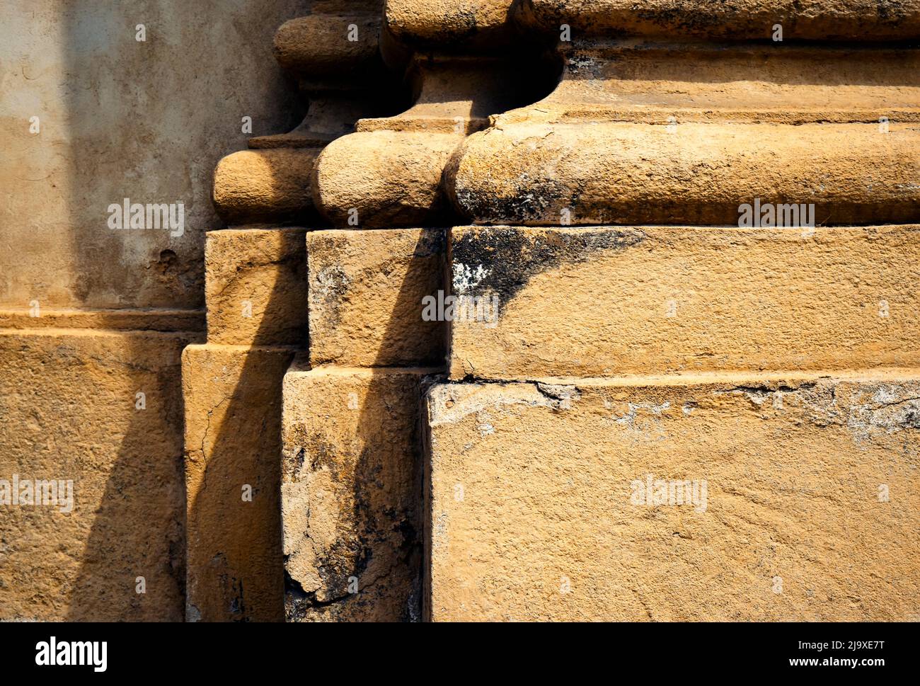 Architectural background pilar of the ancient building Stock Photo - Alamy
