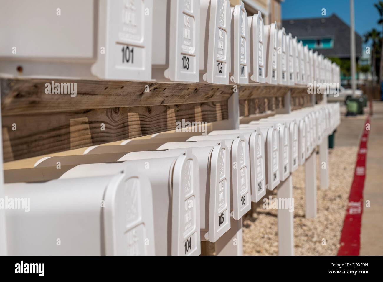 White US Mailboxes in two rows, closeup with shallow depth of field ...