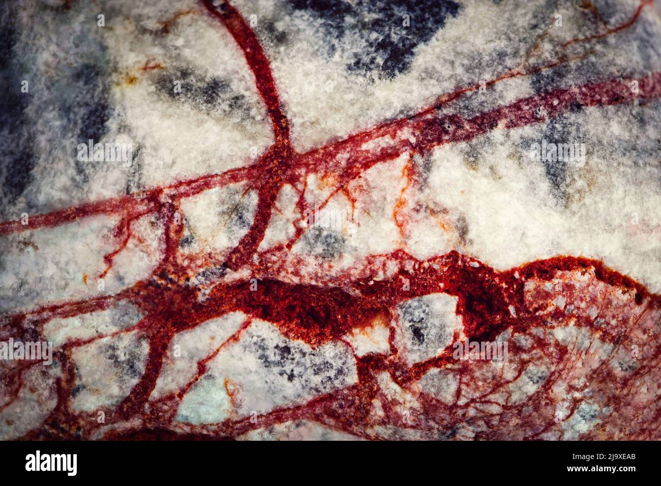 abstract background or texture quartz with red veins Stock Photo - Alamy
