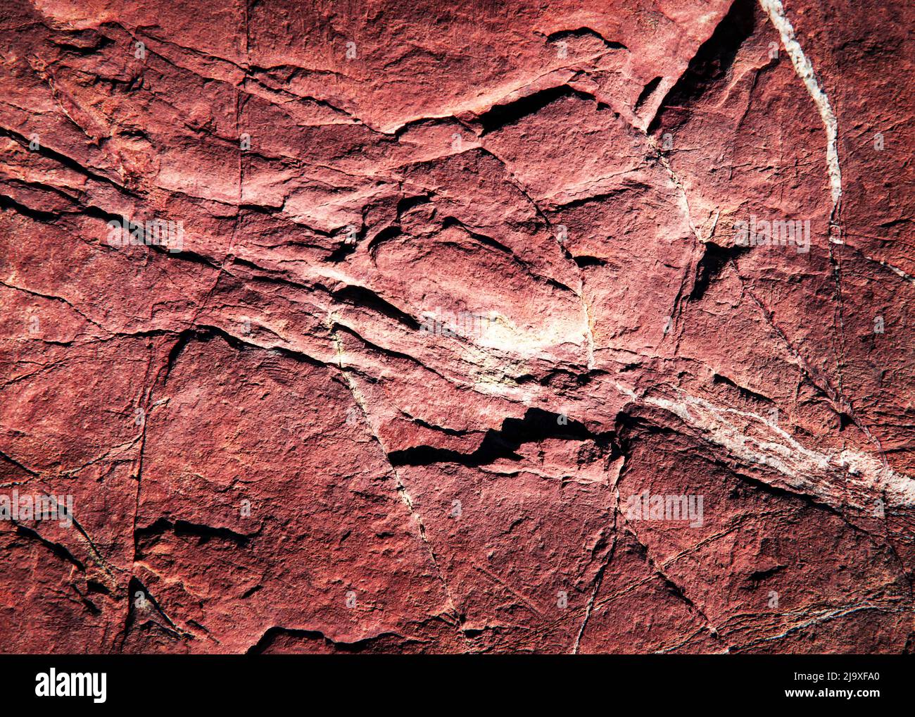 abstract background or texture red colored limestone with grooves Stock ...