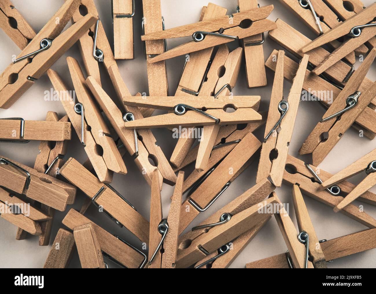 retro background withdetail wooden pegs on clothes Stock Photo - Alamy
