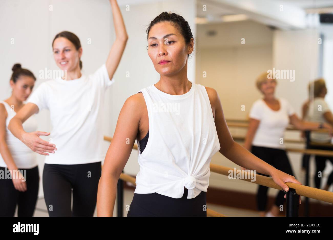 Portrait of a Asian woman doing ballet in a dance studio Stock Photo ...
