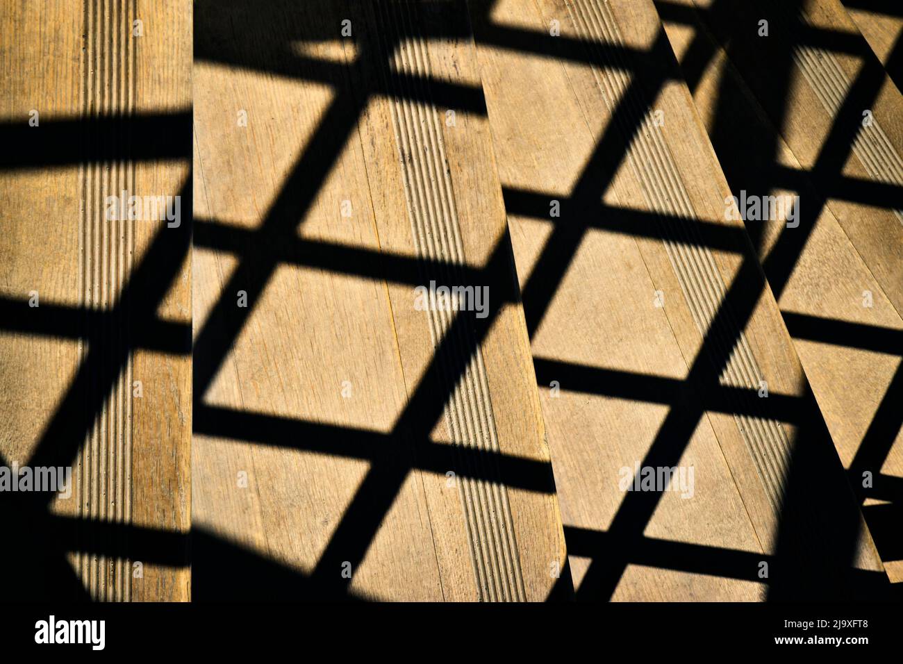 On wooden stairs hi-res stock photography and images - Alamy