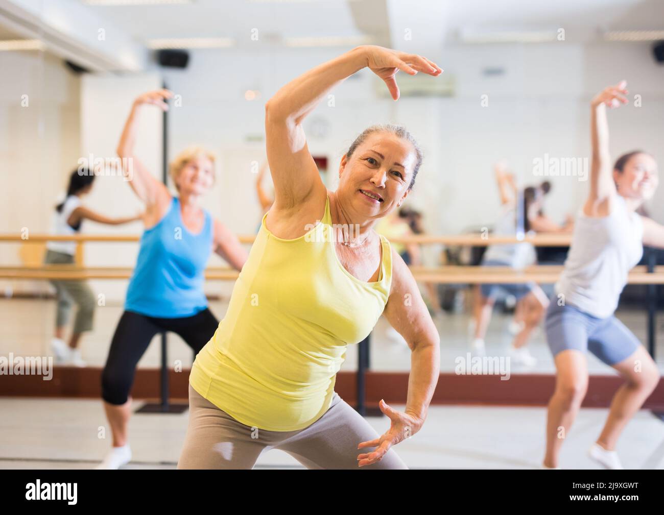 Group of adult people practicing dance techniques Stock Photo - Alamy