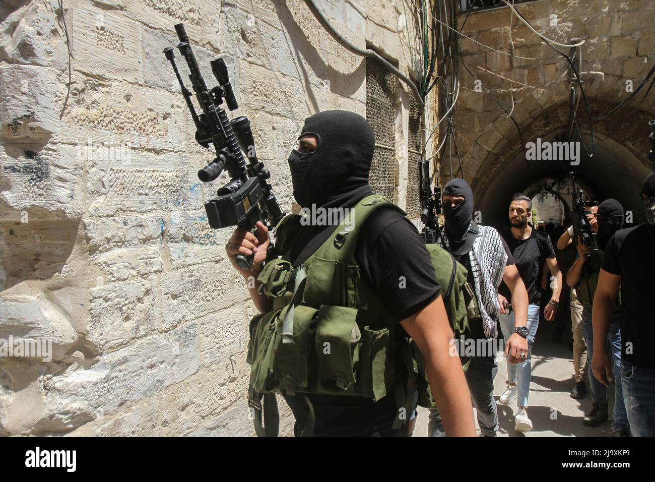 Nablus, Palestine. 12th May, 2022. A masked Palestinian gunman ...