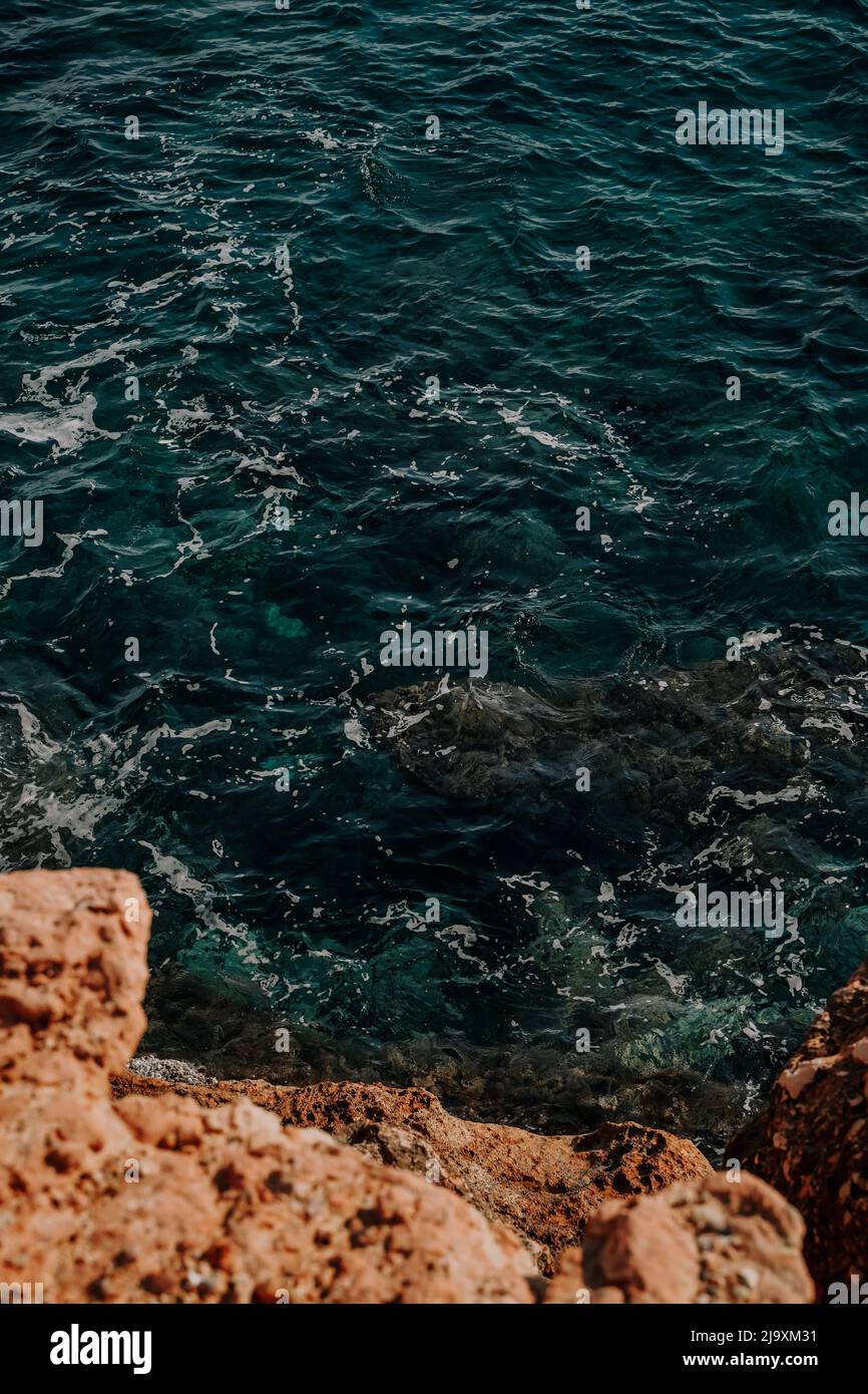 Stone cliffs in the sea Stock Photo - Alamy