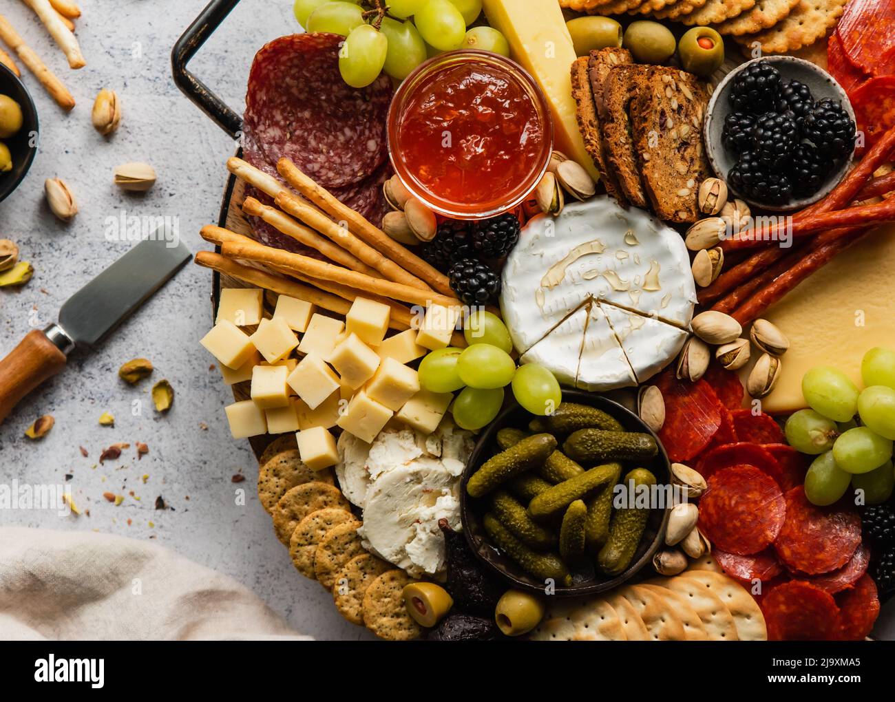 Close up of charcuterie board of cheese, meat, crackers and fruit Stock ...