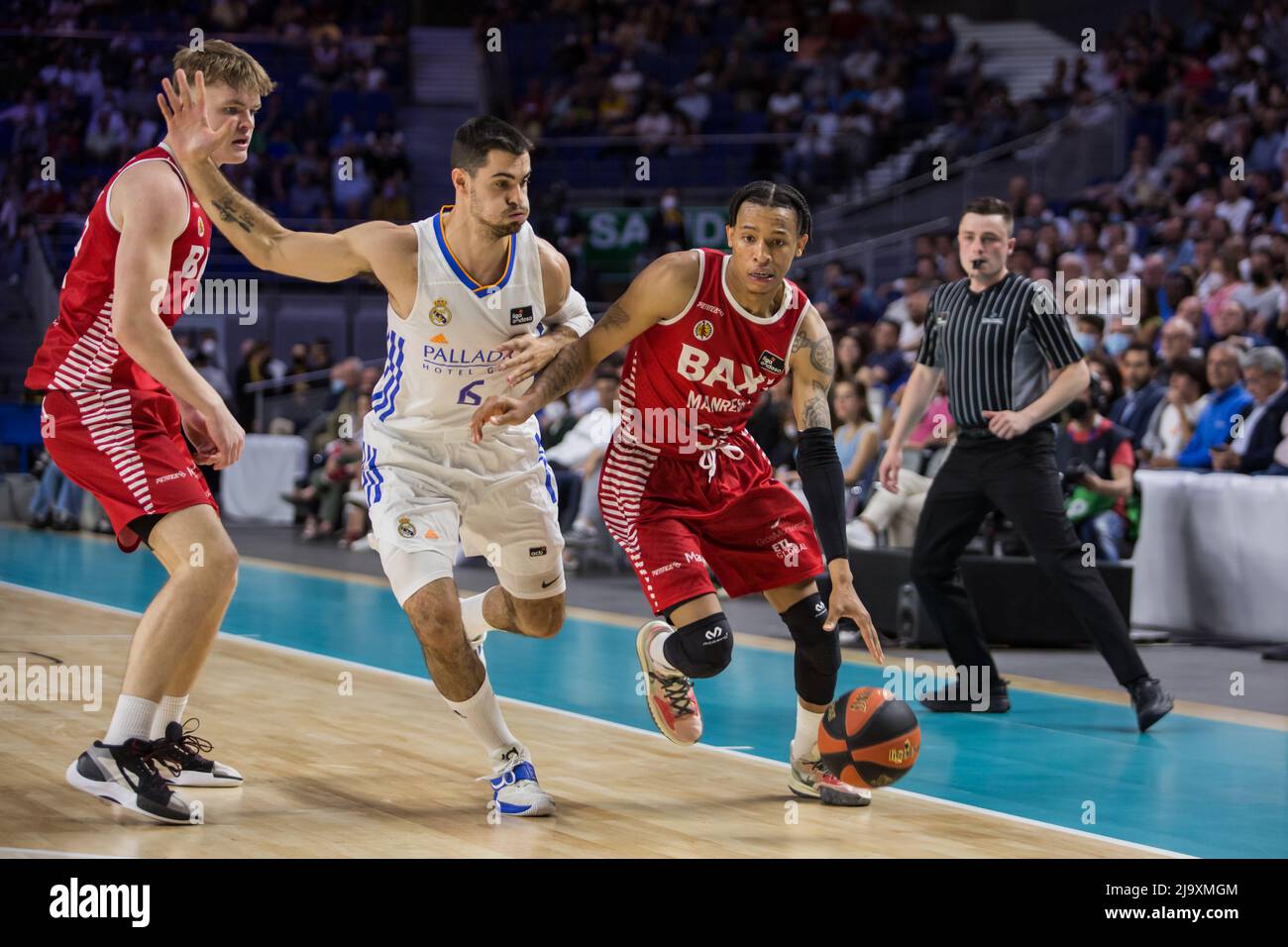 Madrid, Spain. 25th May, 2022. Joe Thomasson (R) and Alberto Abalde (C ...