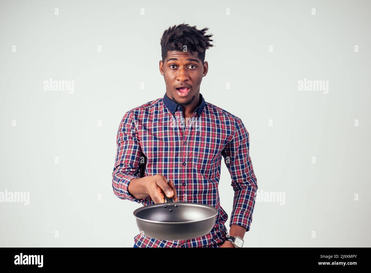 african american chef kitchener holding a frying pan wizard man cooking ...