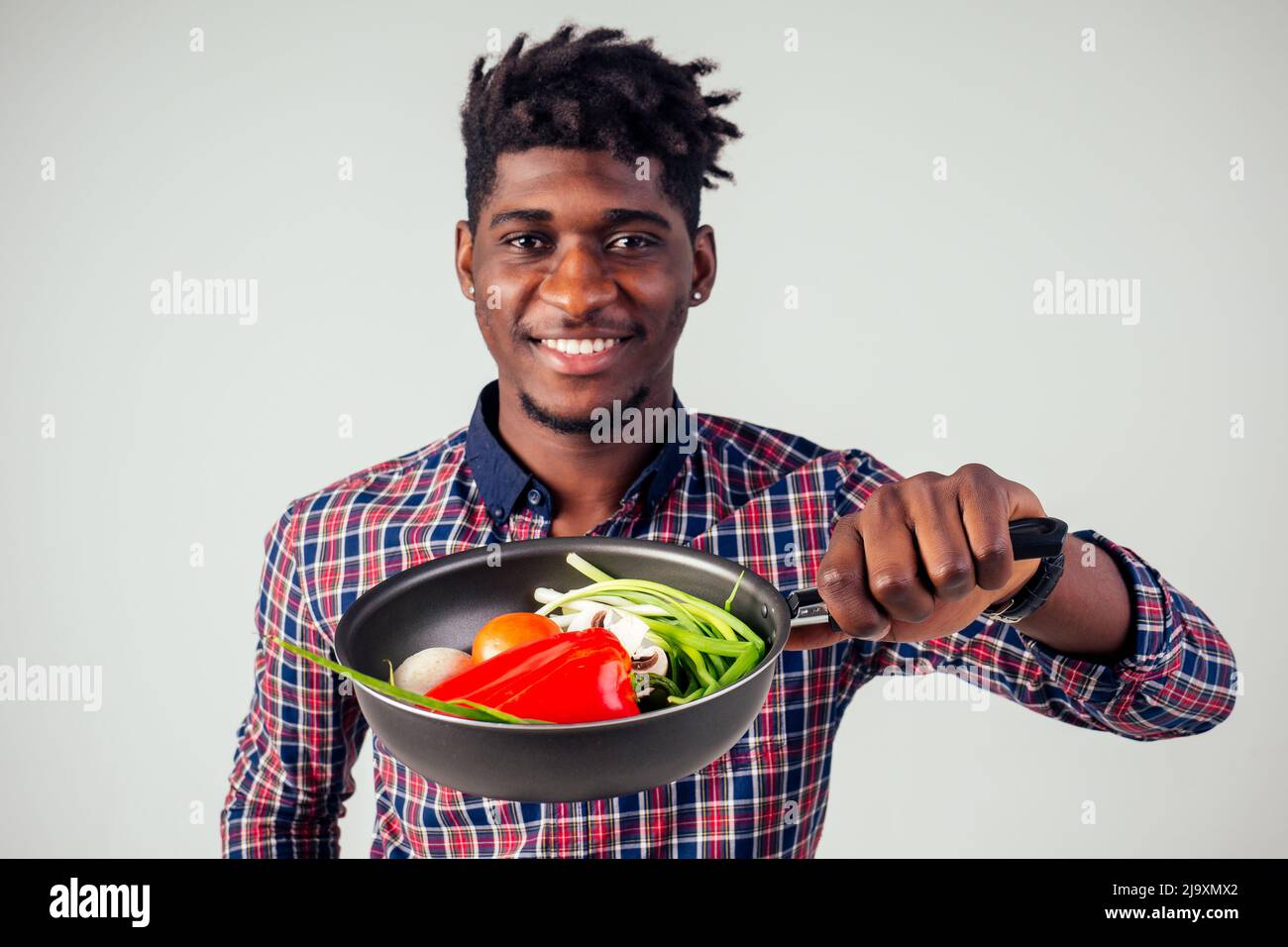 african american chef kitchener holding a frying pan wizard man cooking ...