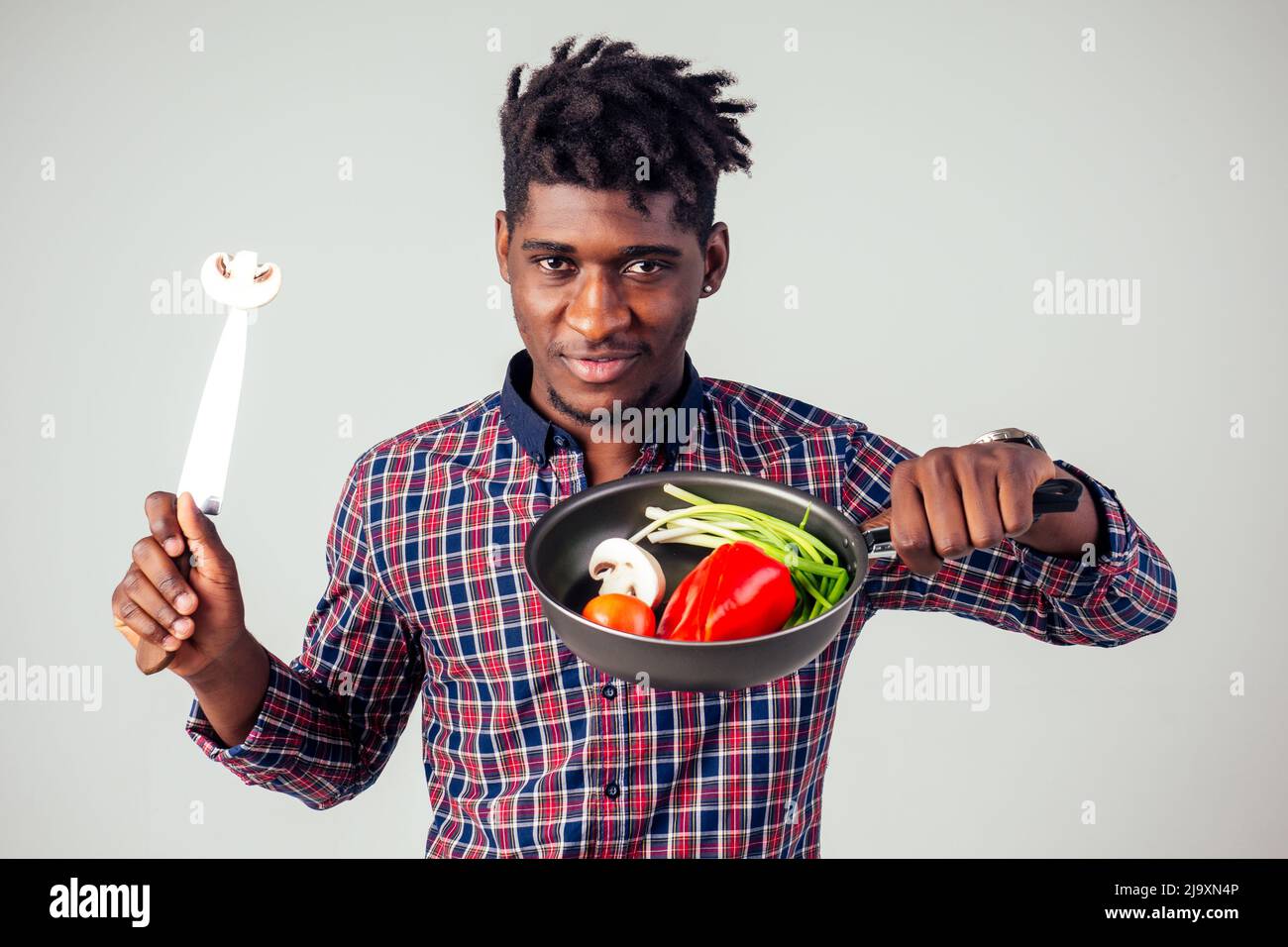 african american chef kitchener holding a frying pan wizard man cooking ...