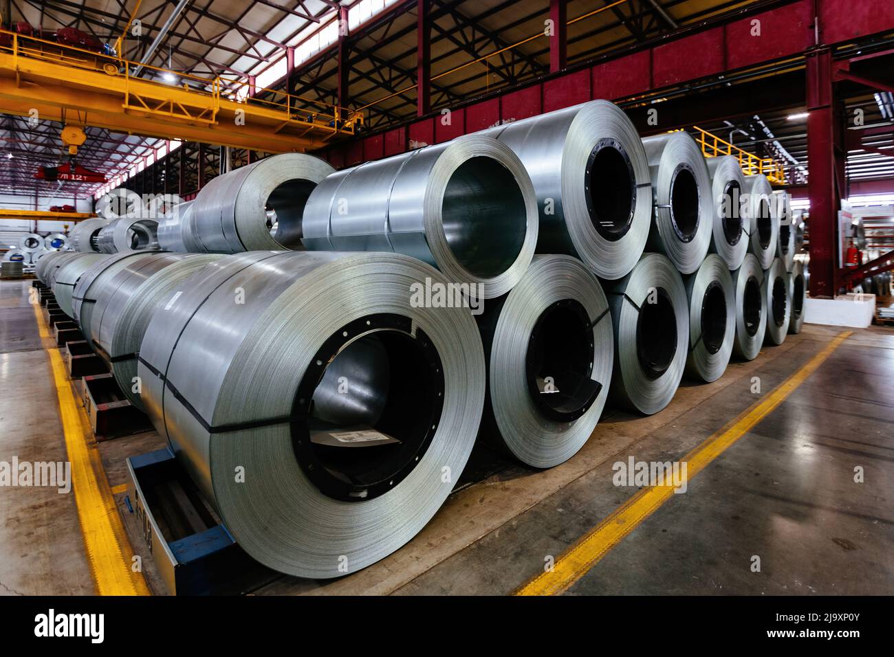 Rolls of galvanized steel sheet inside the factory or warehouse Stock ...