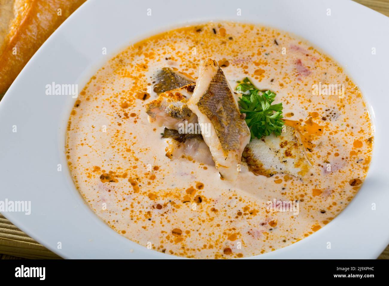 Cod chowder with vegetables Stock Photo - Alamy