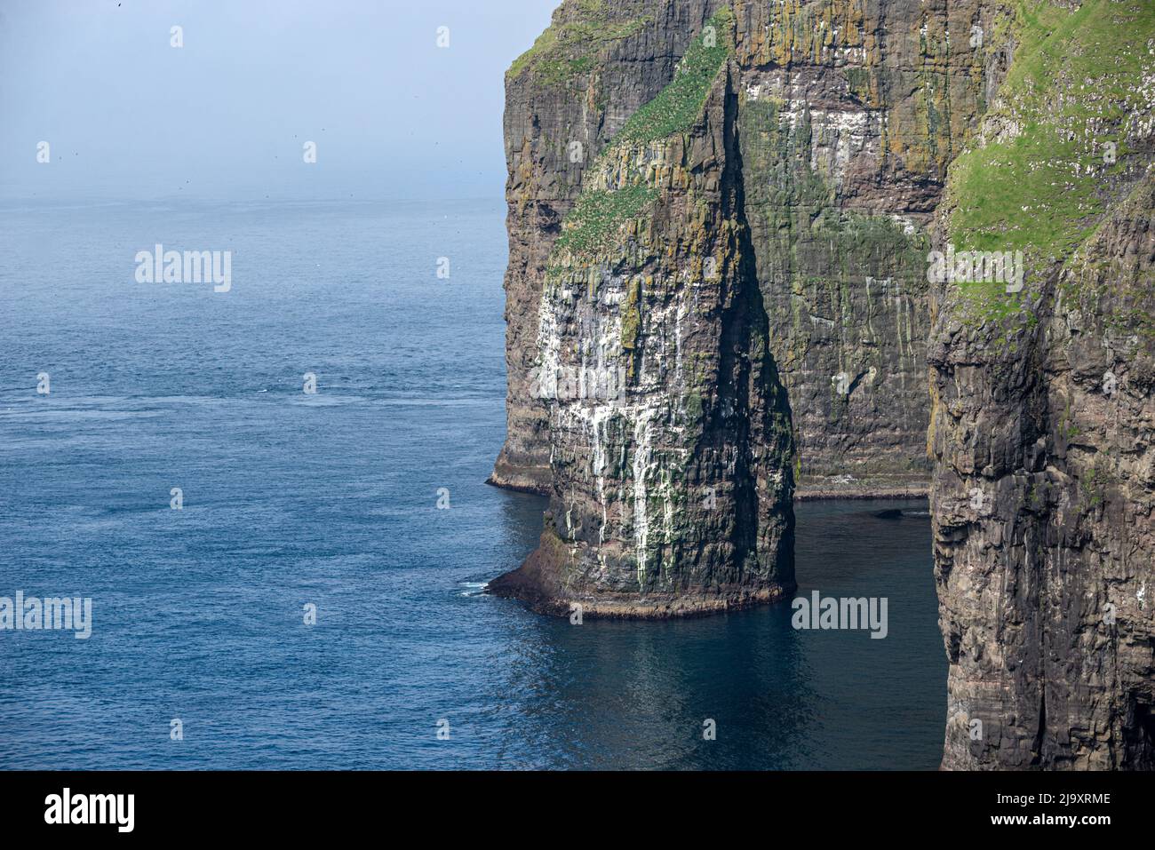 Asmundastakkur sea stack, Suduroy Island, Faroe Islands Stock Photo - Alamy