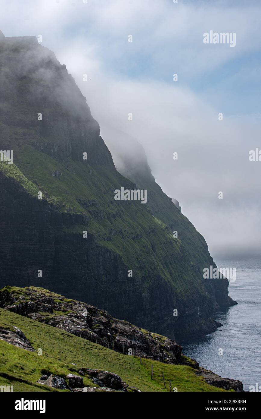 Asmundastakkur sea stack, Suduroy Island, Faroe Islands Stock Photo - Alamy