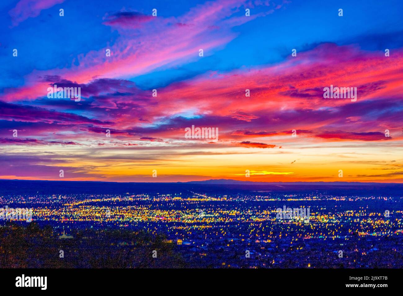 Albuquerque cityscape at night from elevated view of town. Sunset sky ...