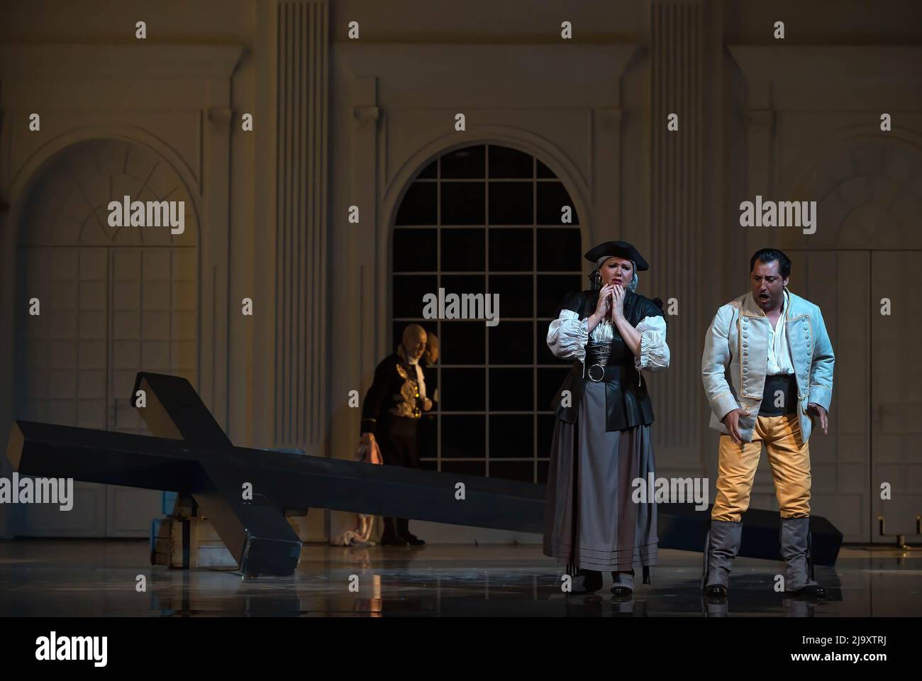 Actors perform with a huge cross during a general rehearsal of the ...