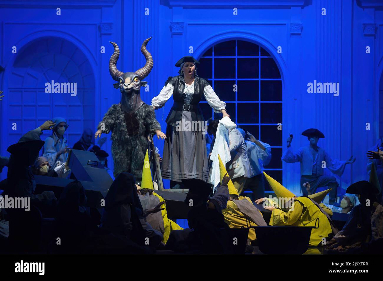 Actors perform with a huge cross during a general rehearsal of the ...