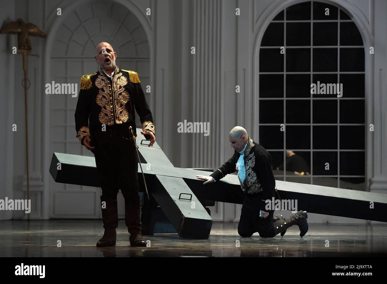 Actors perform with a huge cross during a general rehearsal of the ...