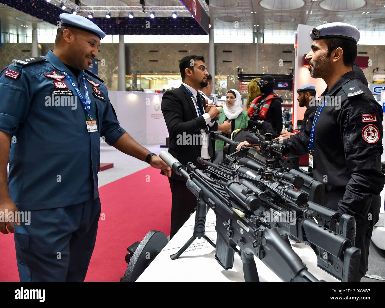 Doha, Qatar. 25th May, 2022. Visitors look at guns at the Milipol Qatar ...