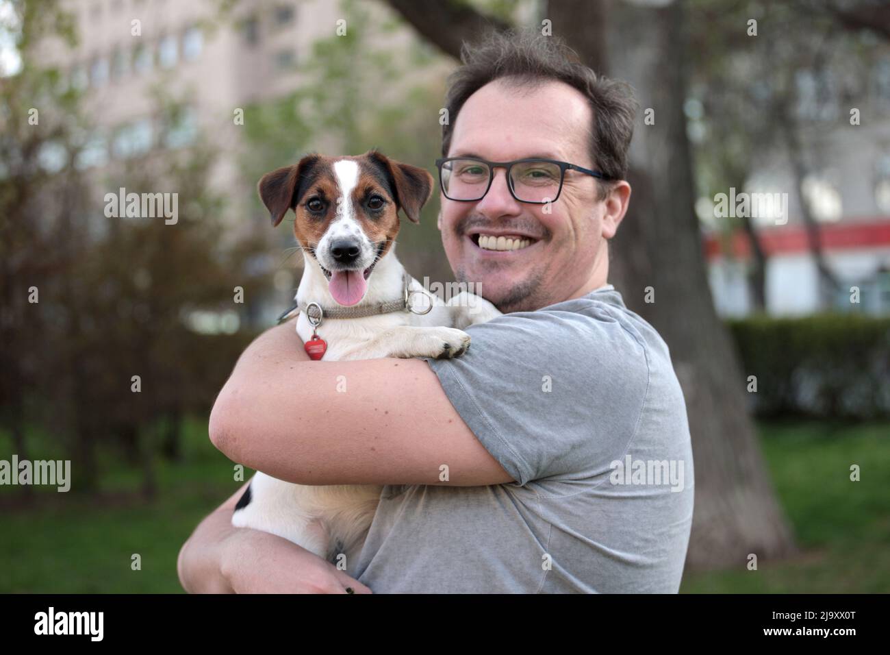 Positive not shaved, not combed plus size man with jack russell puppy ...