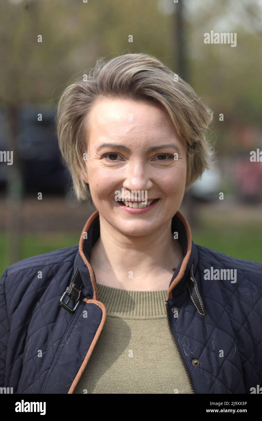 Beautiful mid age woman close-up portrait in modern casual wear ...