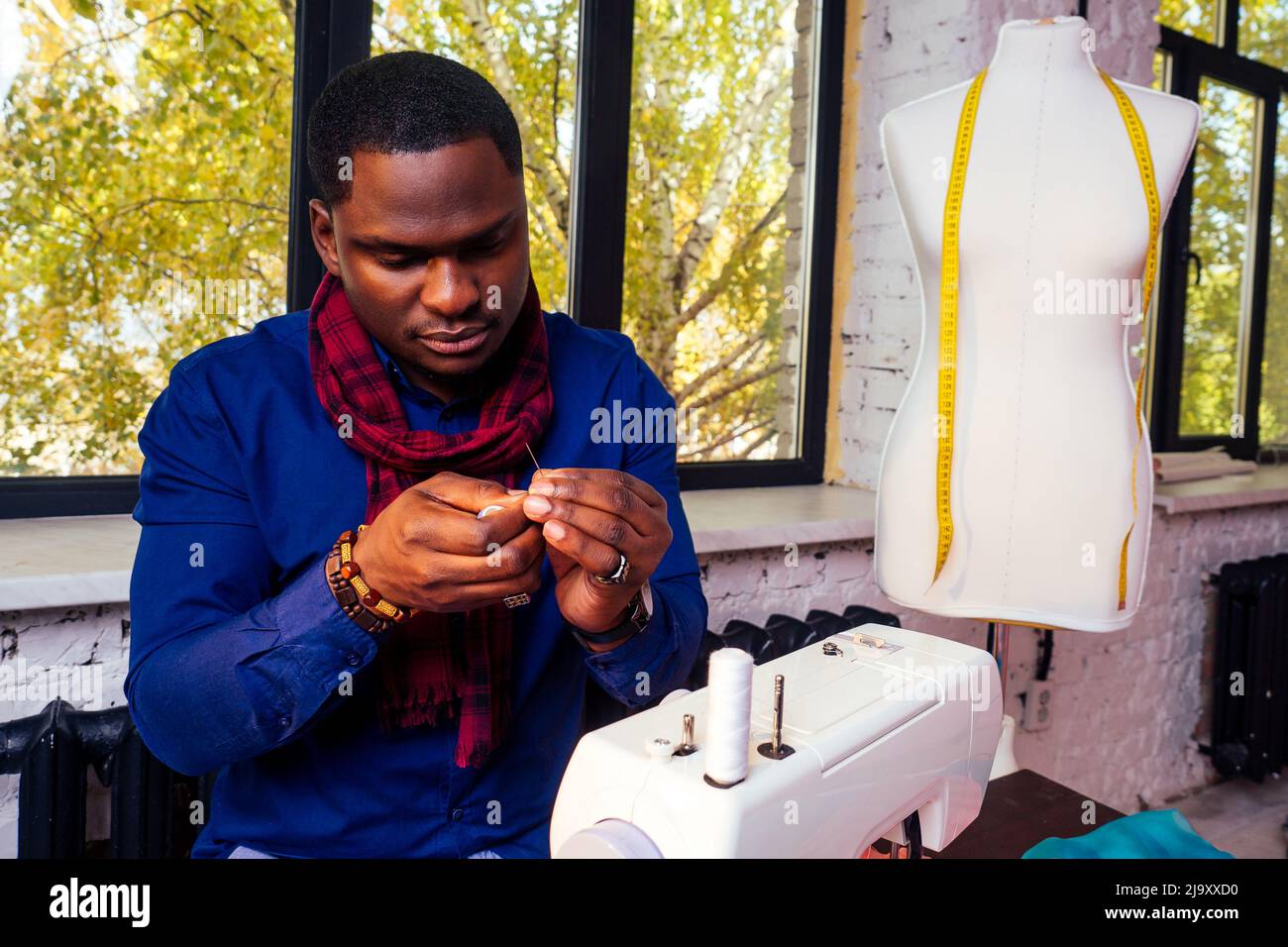 Tailor occupation hi-res stock photography and images - Alamy