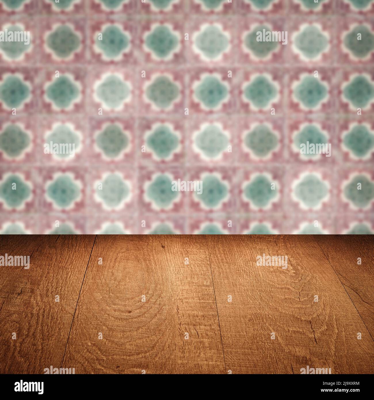 Empty wood table top and blur vintage ceramic tile pattern wall in ...