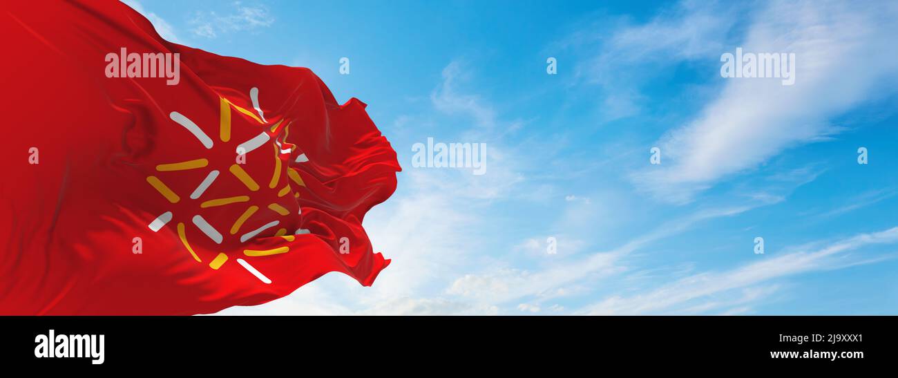 flag of Languedoc Roussillon , France at cloudy sky background on ...