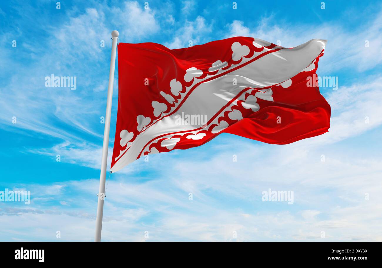 flag of Basse Alsace, France at cloudy sky background on sunset ...