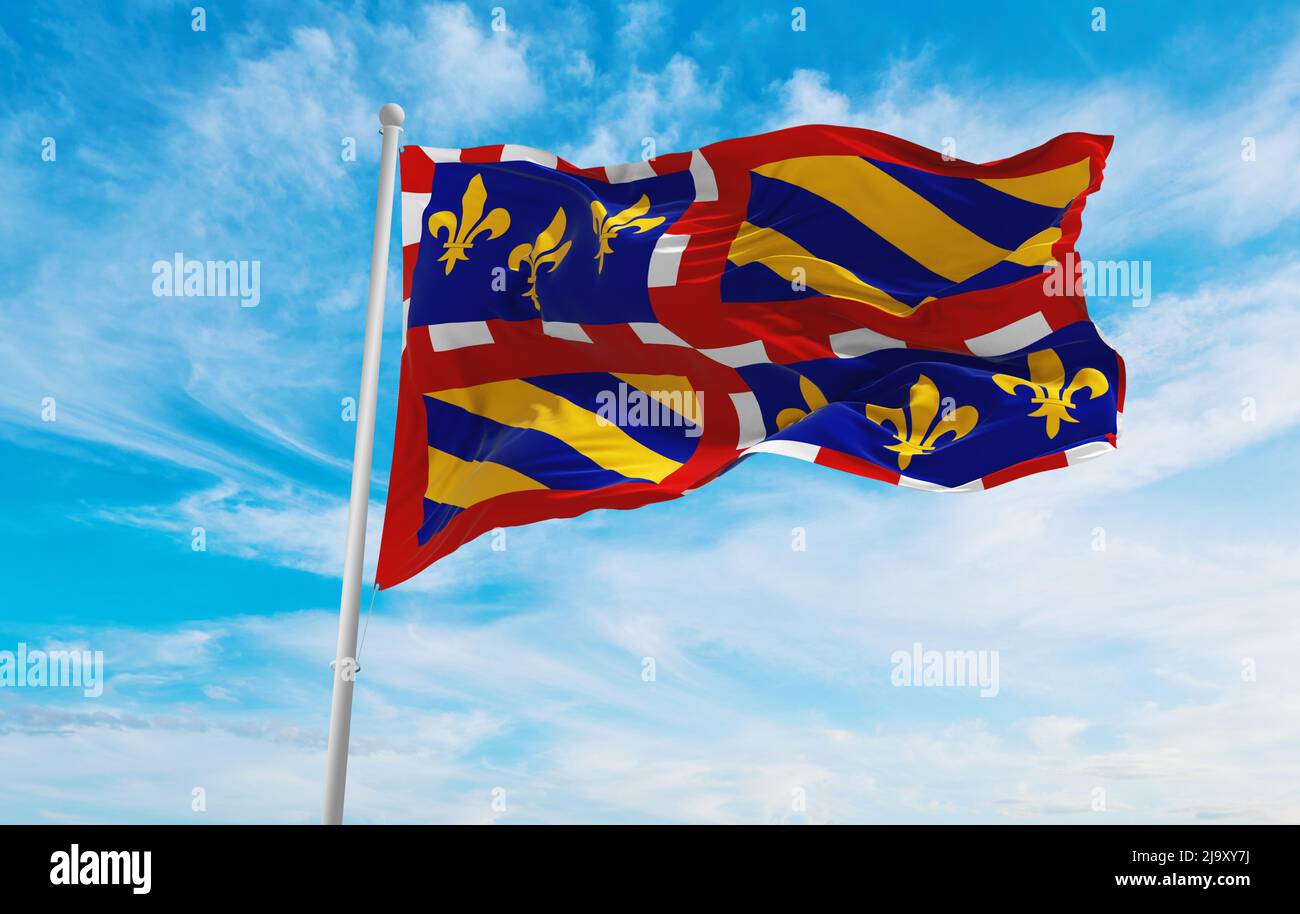 flag of Bourgogne, France at cloudy sky background on sunset, panoramic ...
