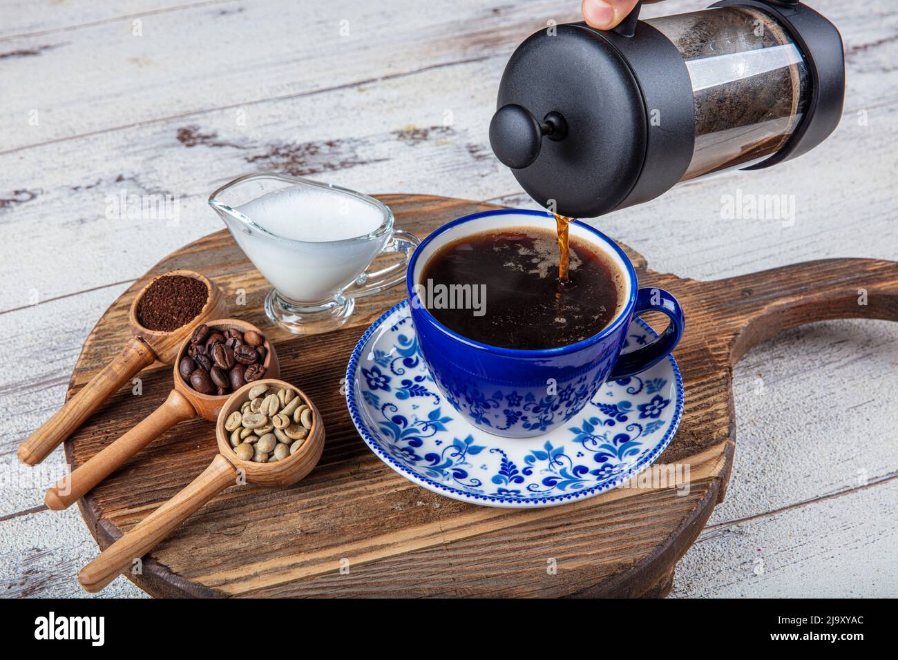 Filter coffee. The steam from Pouring coffee into cup , A cup of fresh ...