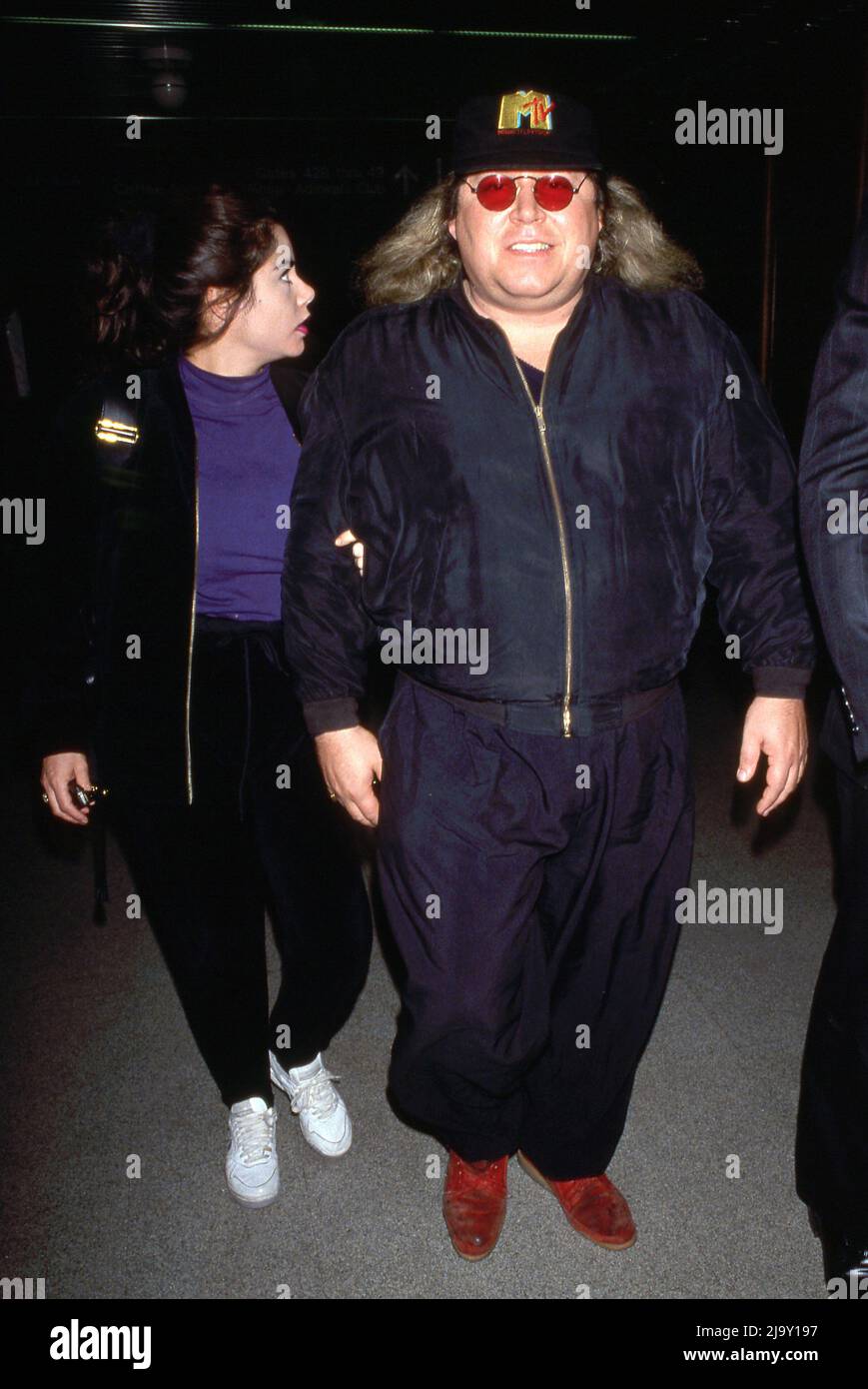 Sam Kinison and Malika Souiri 1992 Credit: Ralph Dominguez/MediaPunch ...