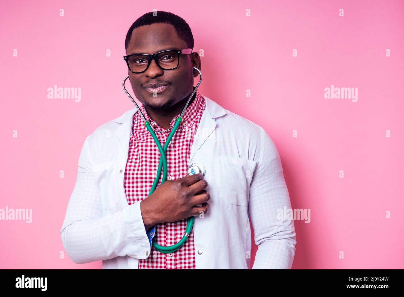 happy male african medical surgeon cardiologist doctor in a white coat ...
