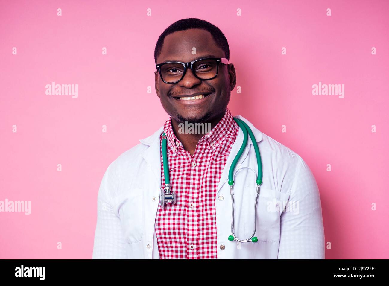 happy male african medical surgeon cardiologist doctor in a white coat ...