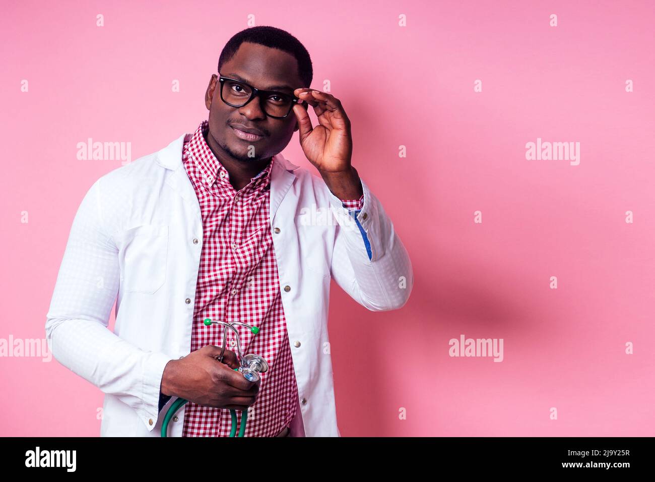 happy male african medical surgeon cardiologist doctor in a white coat ...