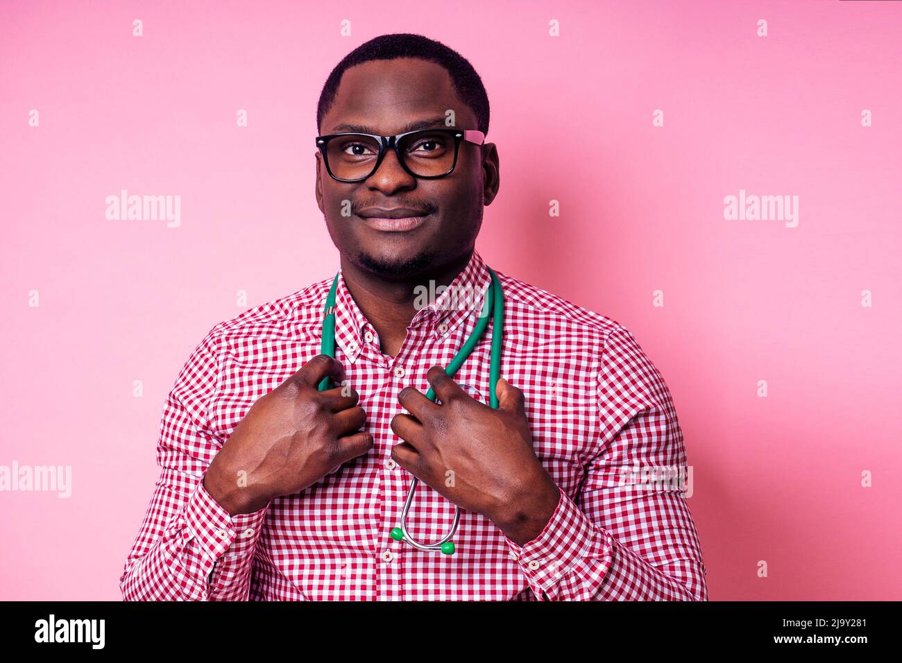 happy male african medical surgeon cardiologist doctor in a white coat ...