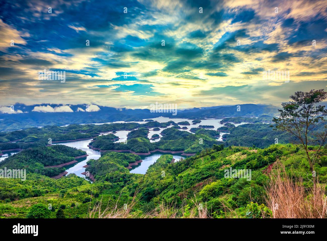 Ta Dung Lake seen from above with a peaceful sunrise sky background ...
