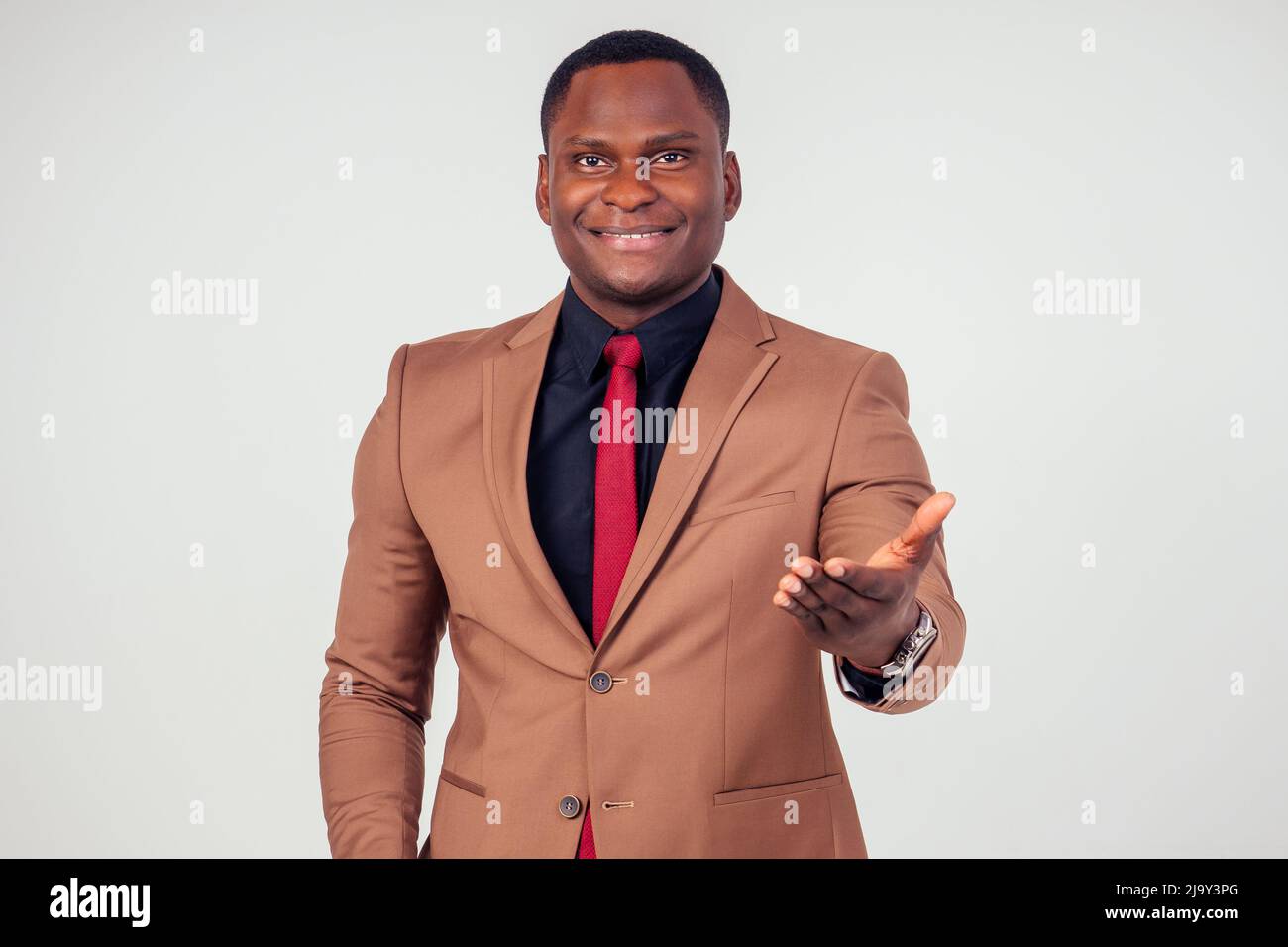 African-American businessman gives a hand for a handshake. Business ...