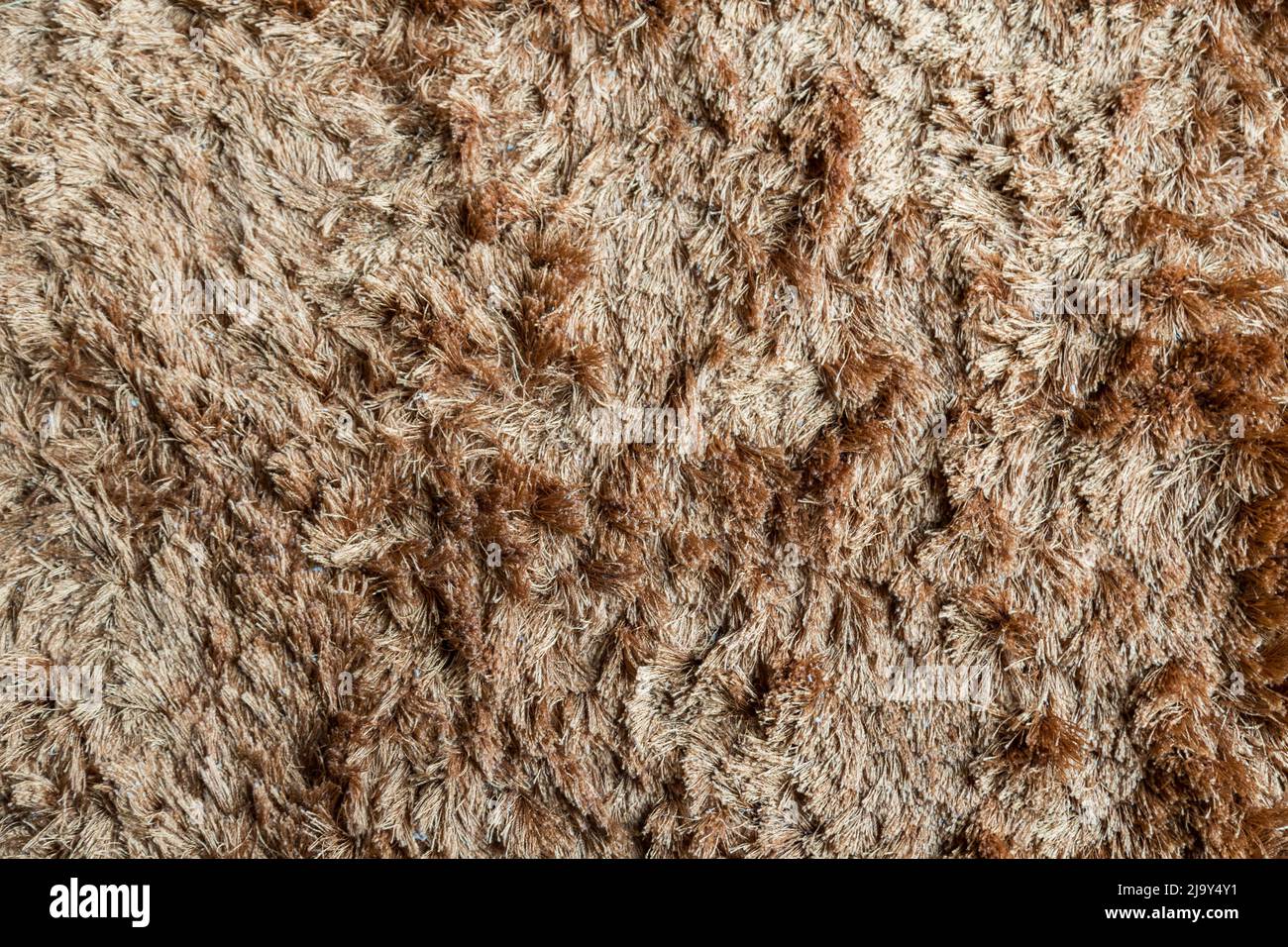Brown fabric carpet with long pile texture background Stock Photo - Alamy