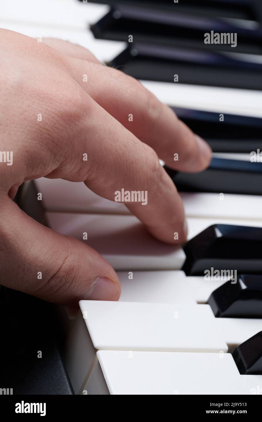 Hand piano hi-res stock photography and images - Alamy