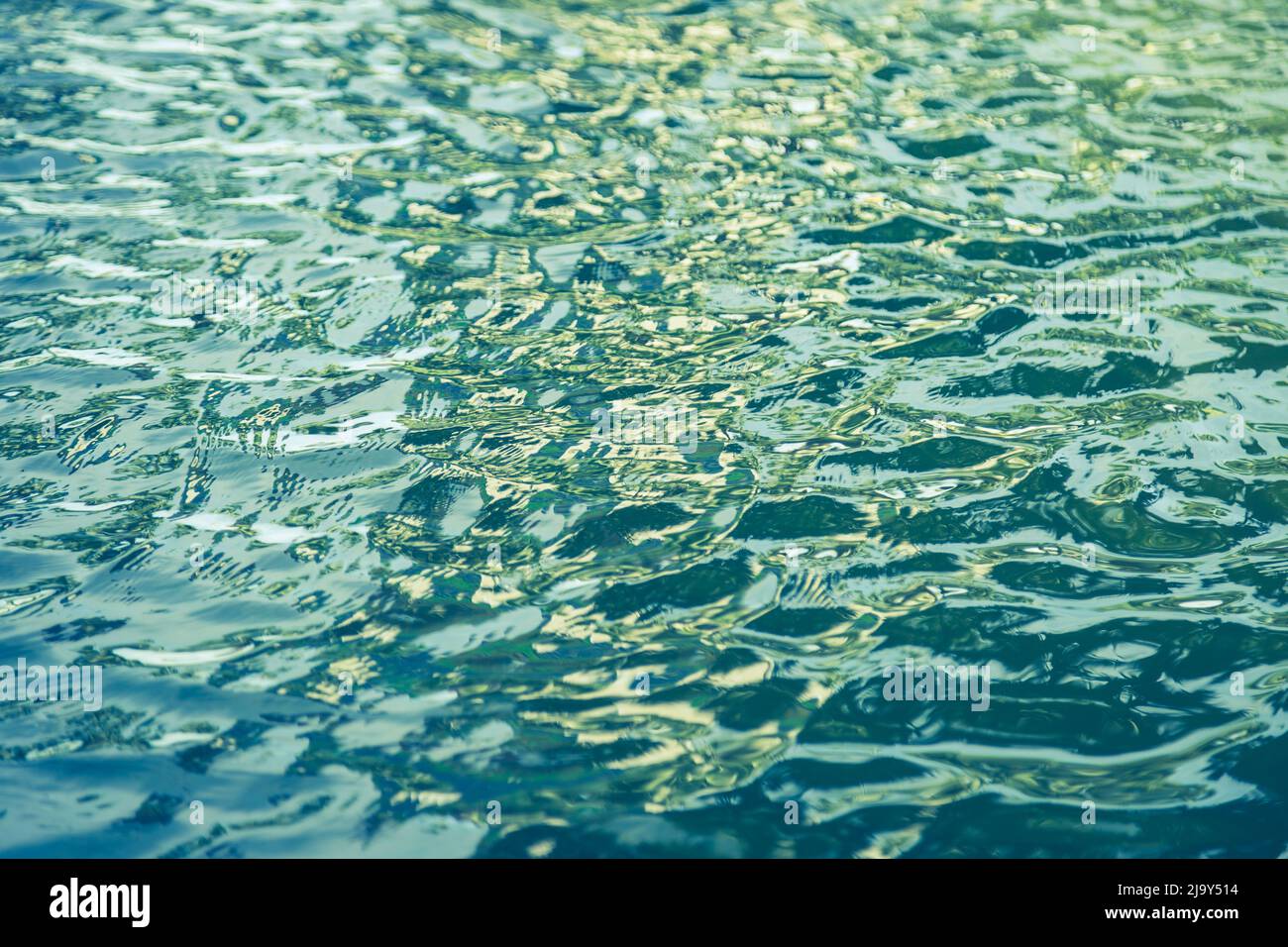 Water wave reflection use for background Stock Photo - Alamy
