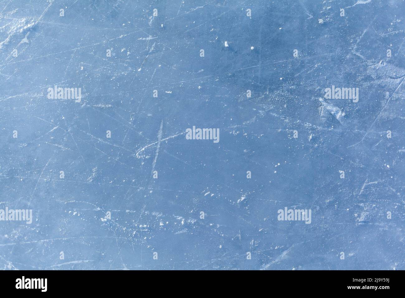 Empty ice rink with skate marks after the session outdoor. skating ice ...