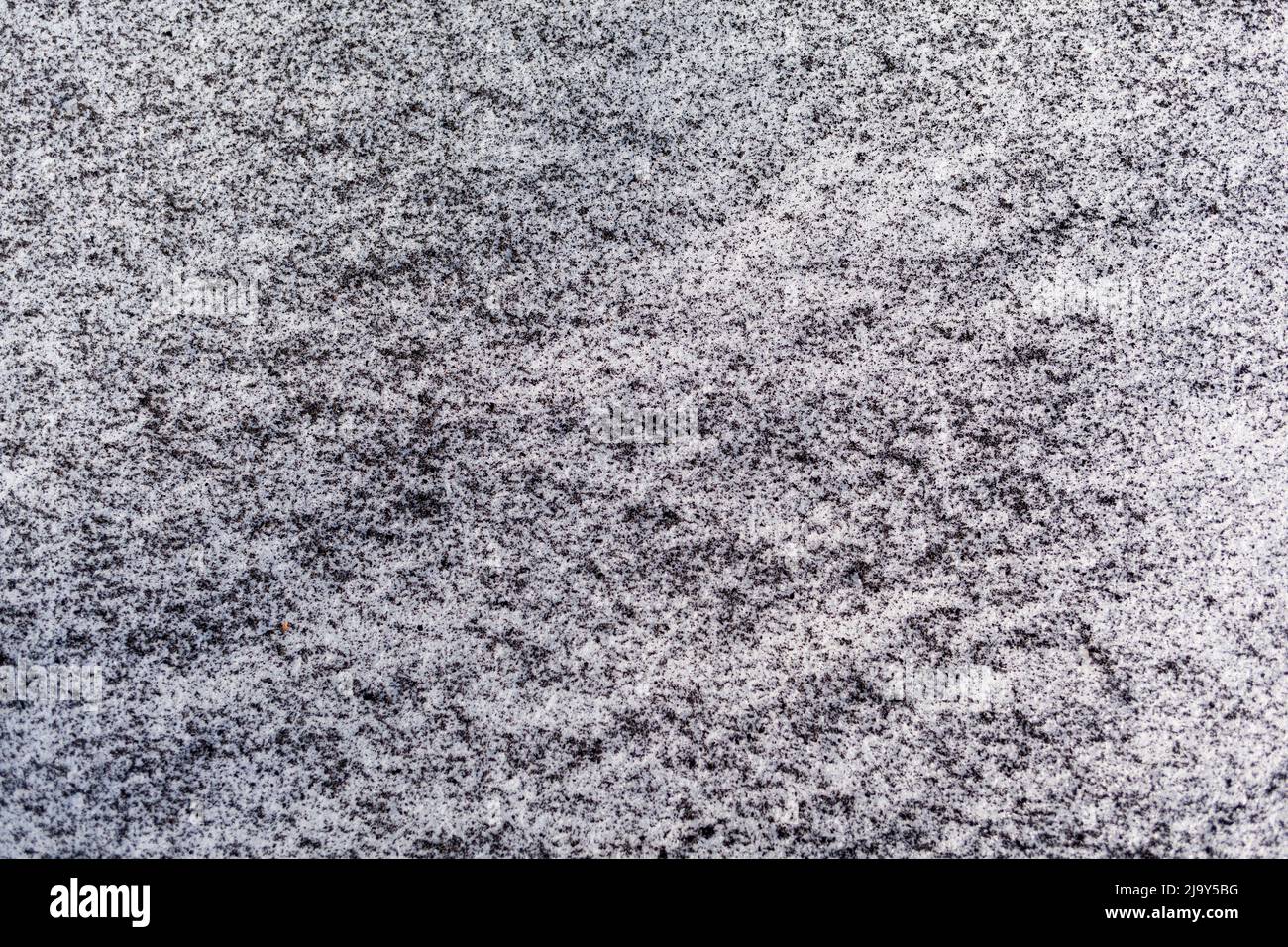 Black soot from the boiler room on white snow. Natural background. Snow ...