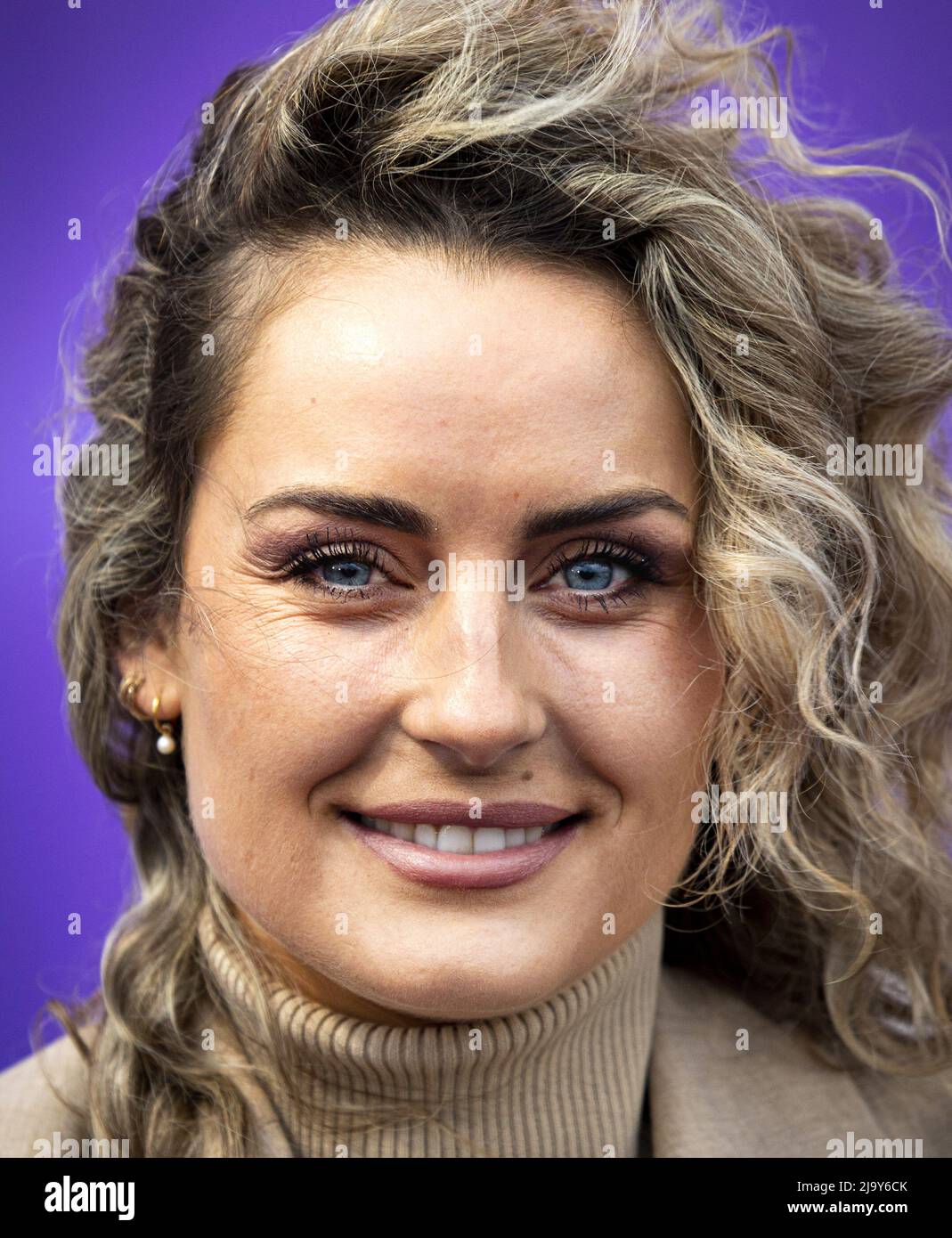 2022-05-25 20:54:34 AMSTERDAM - Iris Rulkens on the purple carpet prior ...