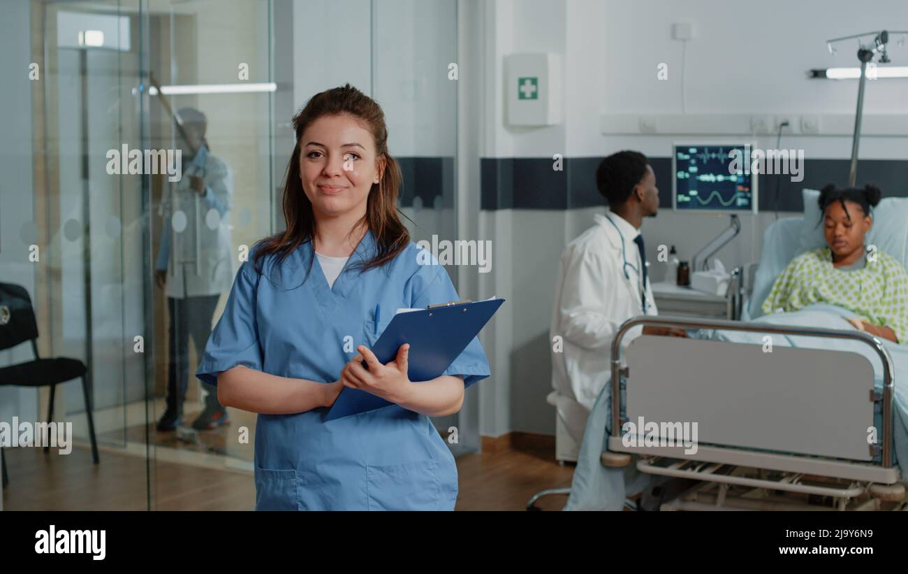 Doctor giving patient documents hi-res stock photography and images - Alamy