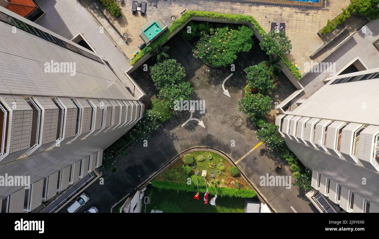 Aerial top down close up of a tall residential towers in Jakarta ...