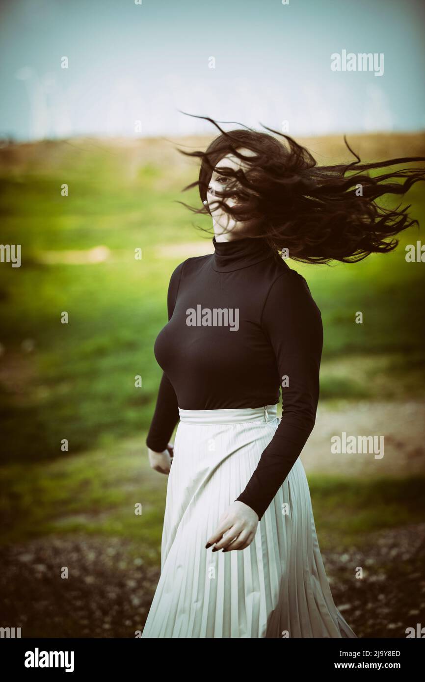 Scared woman turning Stock Photo - Alamy