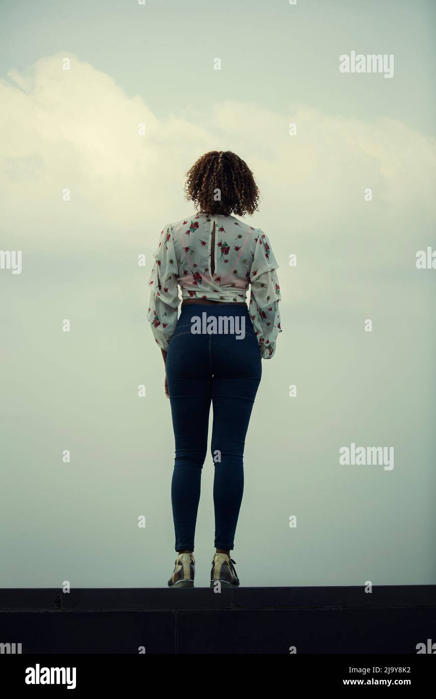 African female standing rear view hi-res stock photography and images ...