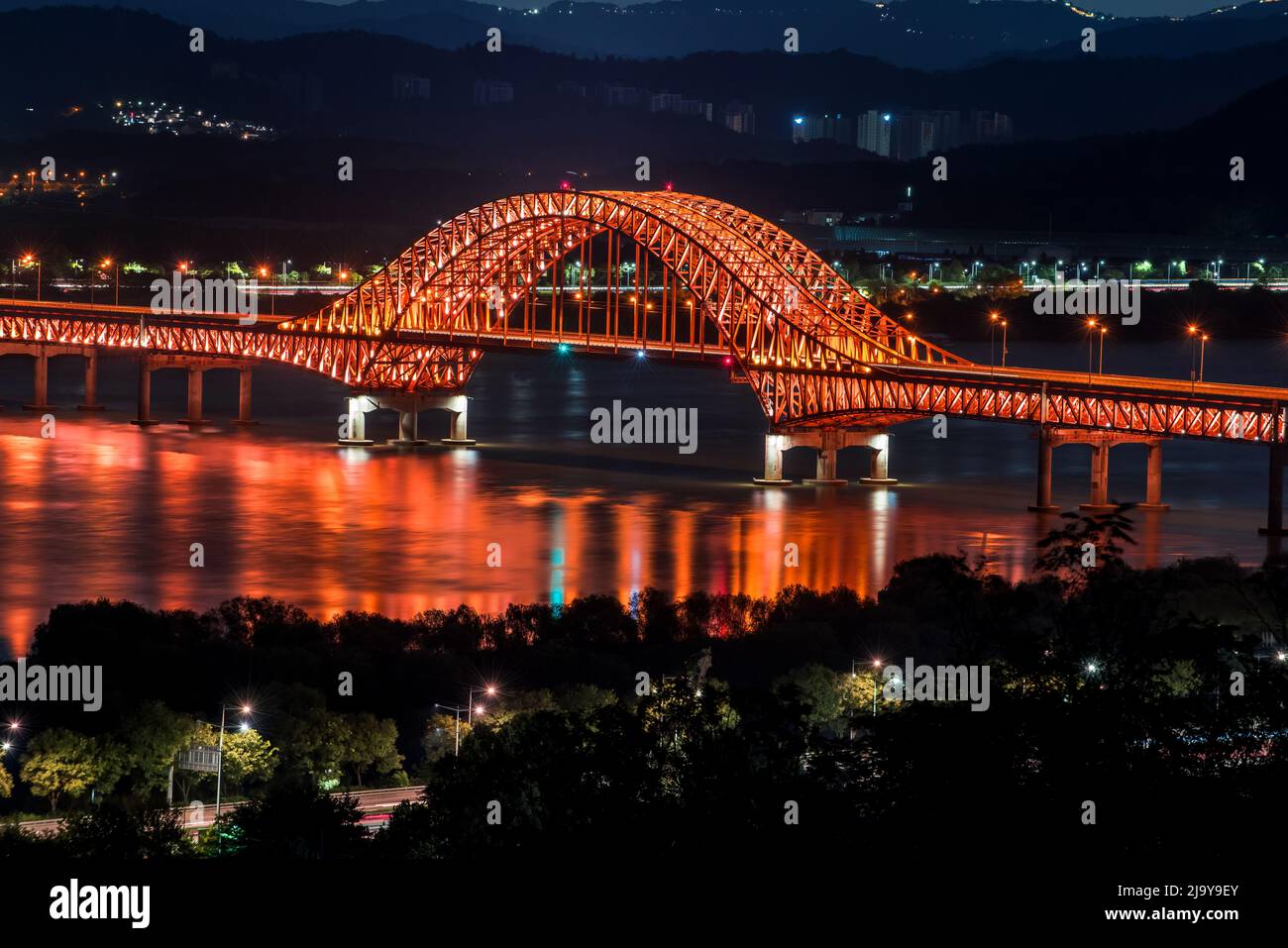 The beautiful night view of grand bridge and reflection Stock Photo - Alamy